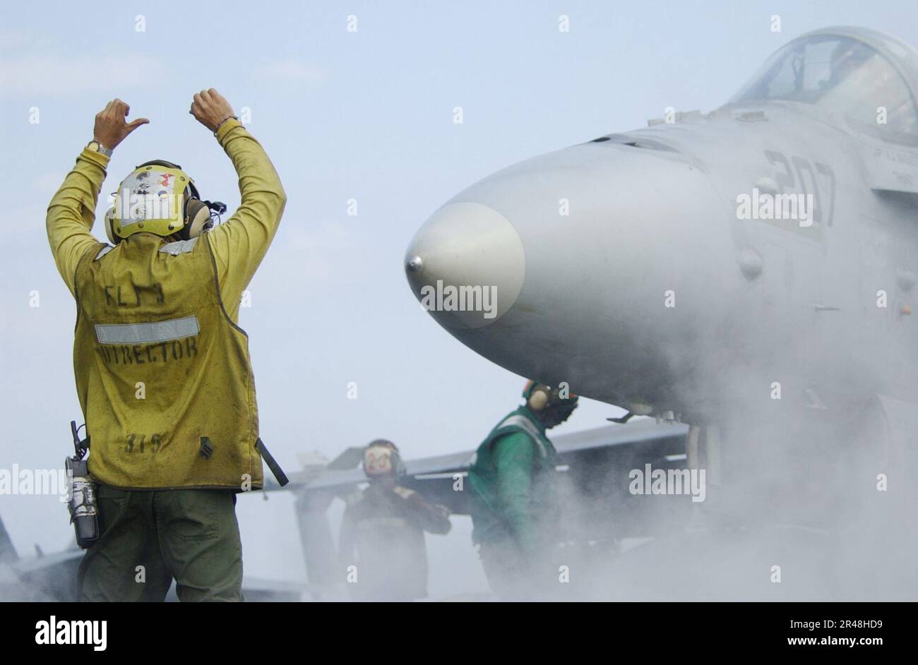 US Navy Flight deck handler at sea Stock Photo - Alamy