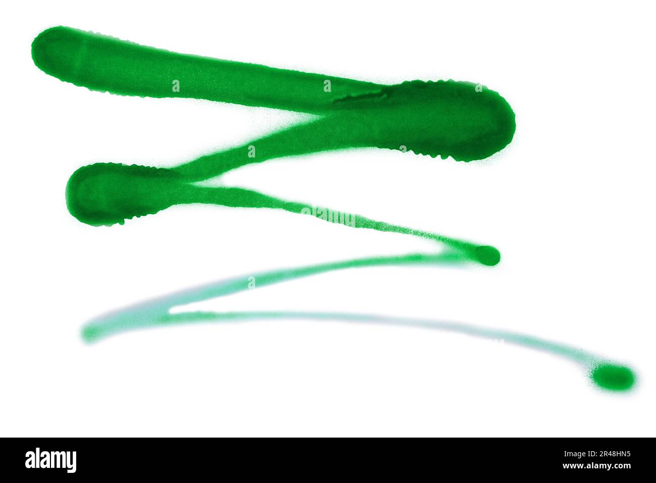Lines drawn by green spray paint on white background Stock Photo - Alamy
