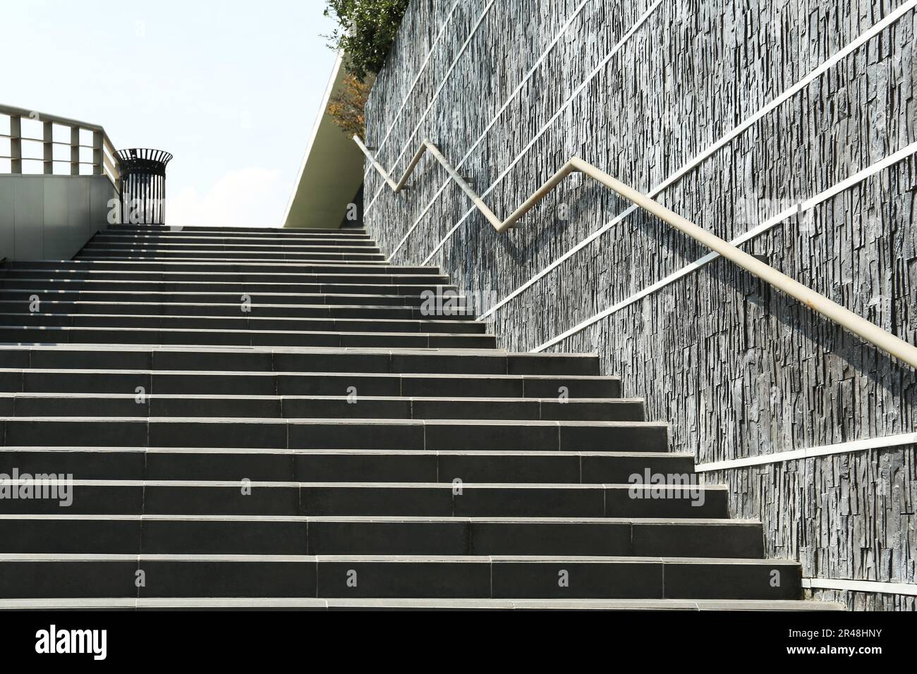 Stairs with metal handrailing outdoors on sunny day Stock Photo - Alamy