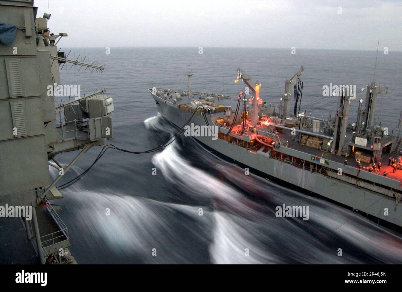 US Navy USNS Rappahannock conducts RAS with USS Kitty Hawk Stock Photo ...