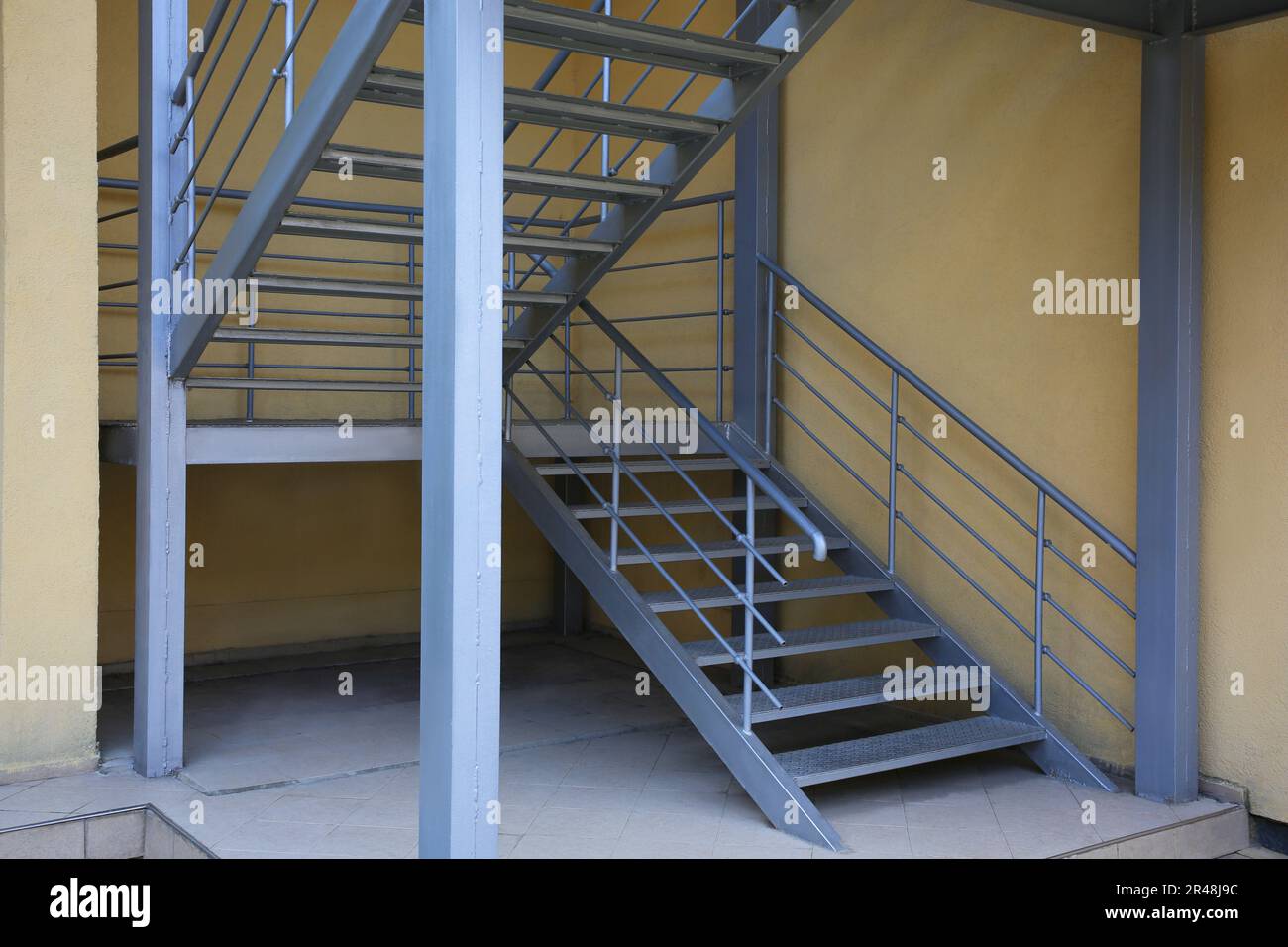 Metal fire escape ladder near building outdoors, low angle view Stock ...