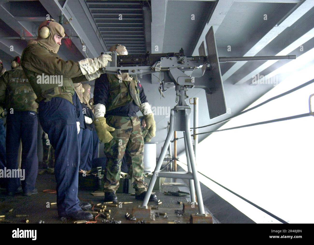 US Navy USS Lincoln - machine gun firing Stock Photo - Alamy