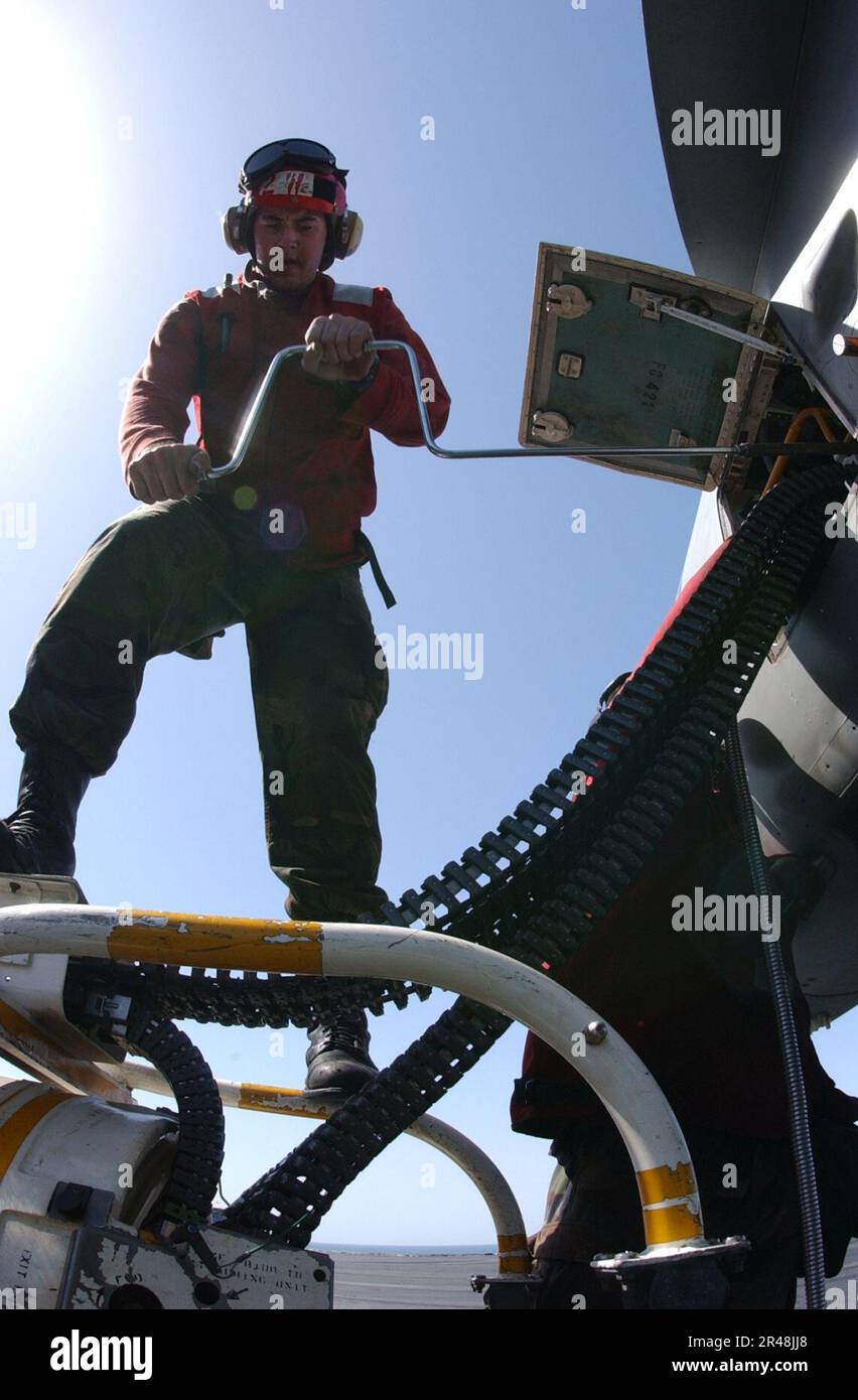 US Navy USS Stennis - F-A-18 gun loading Stock Photo - Alamy