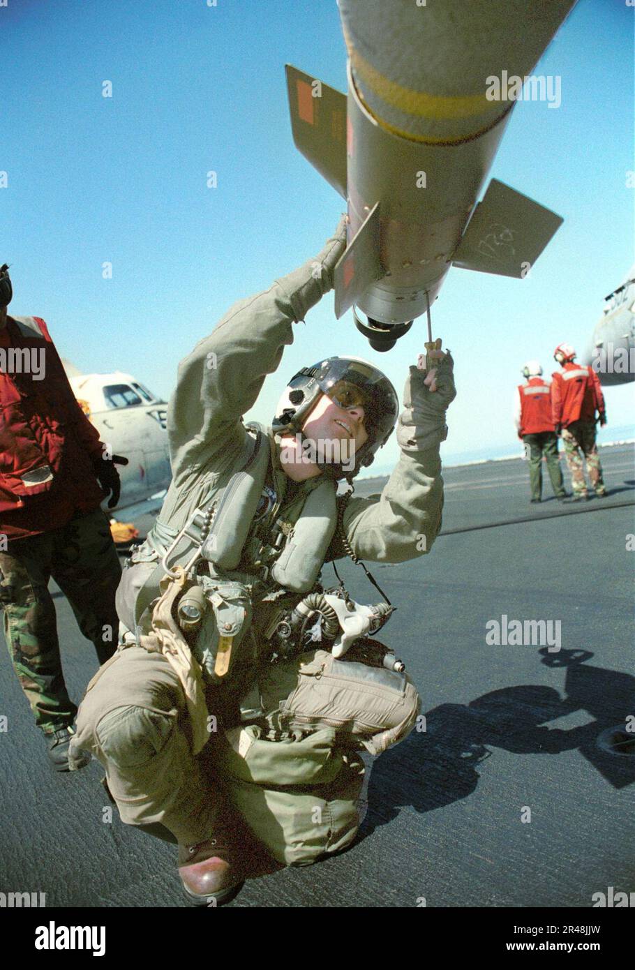 US Navy USS Kennedy - guided bomb setting Stock Photo - Alamy