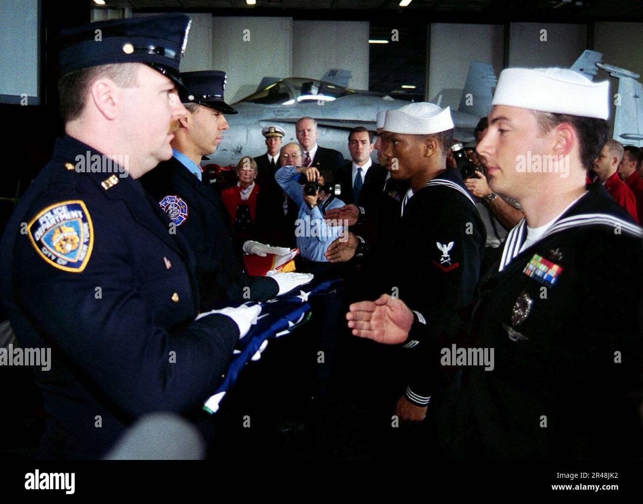 US Navy World Trade Center Flag ceremony aboard CVN 71 Stock Photo - Alamy