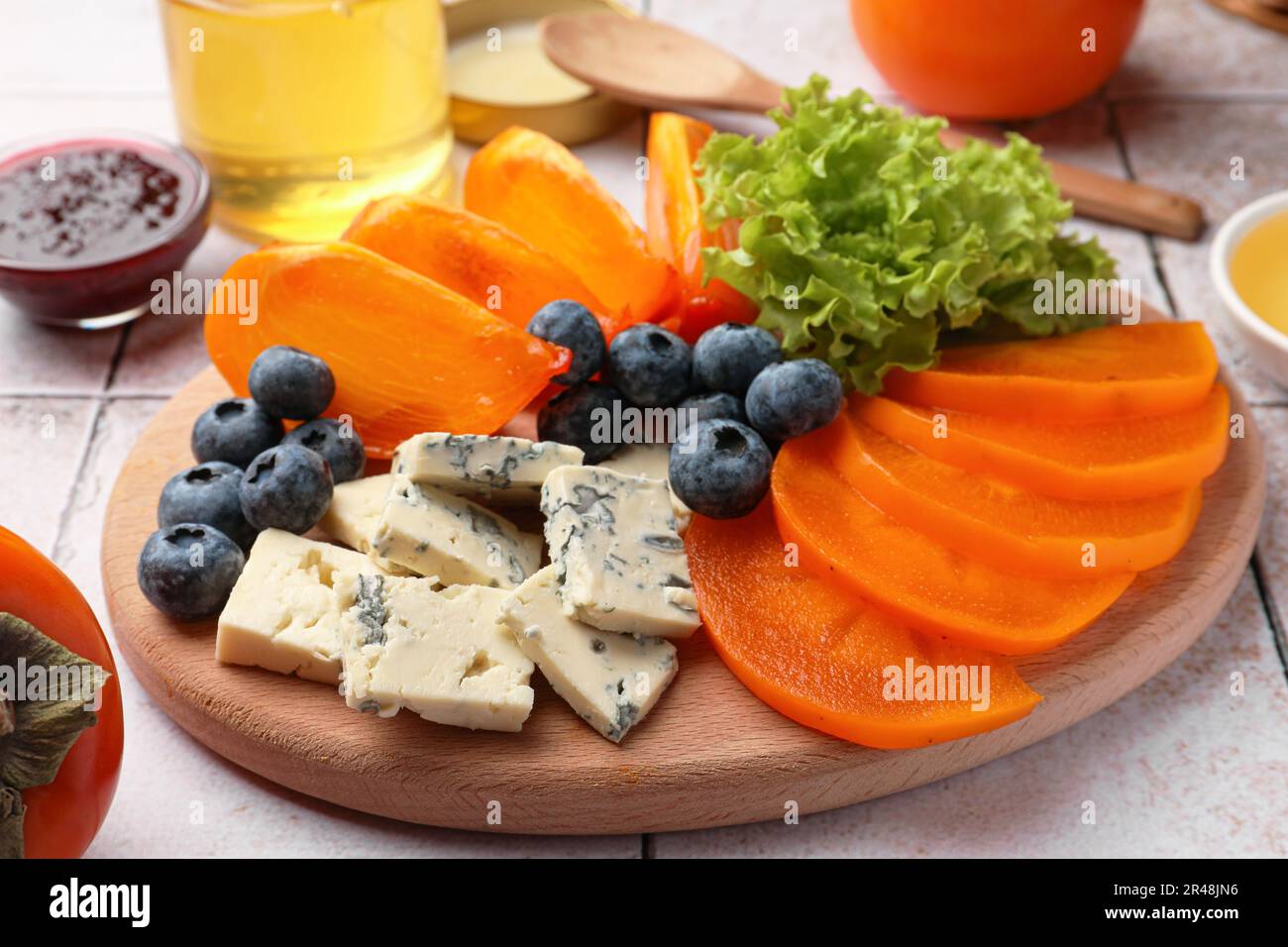 Delicious persimmon blue cheese hi-res stock photography and images - Alamy