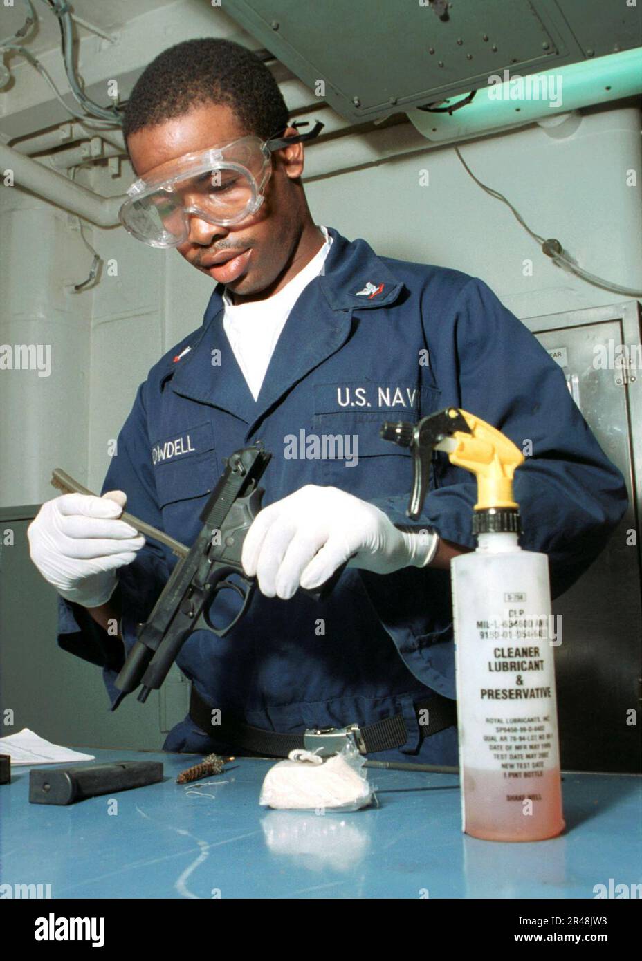 US Navy USS Washington - pistol maintenance Stock Photo - Alamy