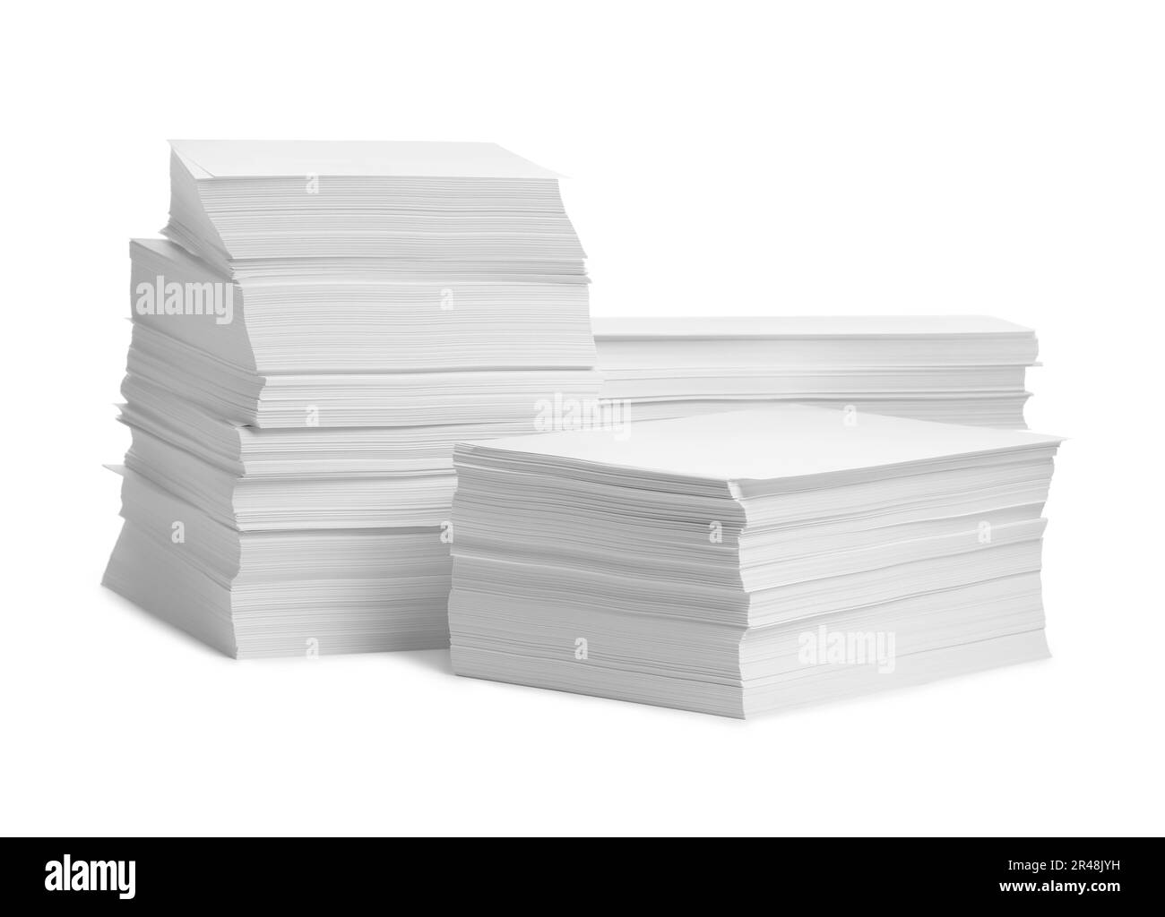 Stacks of paper sheets on white background Stock Photo - Alamy