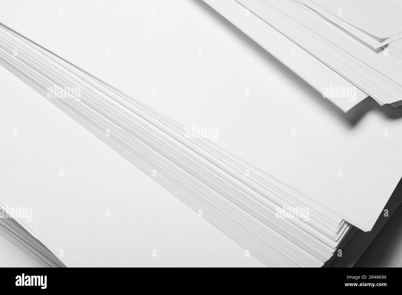 Pile of paper sheets as background, closeup Stock Photo - Alamy