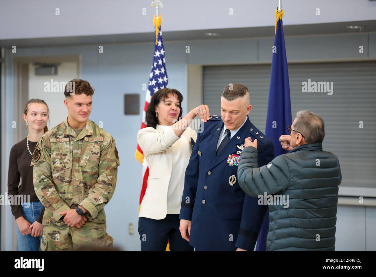 Retired Maj. Robert Hoffman, right, honored guest, pins a star on newly ...
