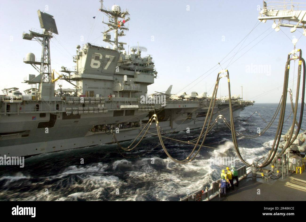 US Navy USS Seattle - unrep with USS Kennedy Stock Photo - Alamy