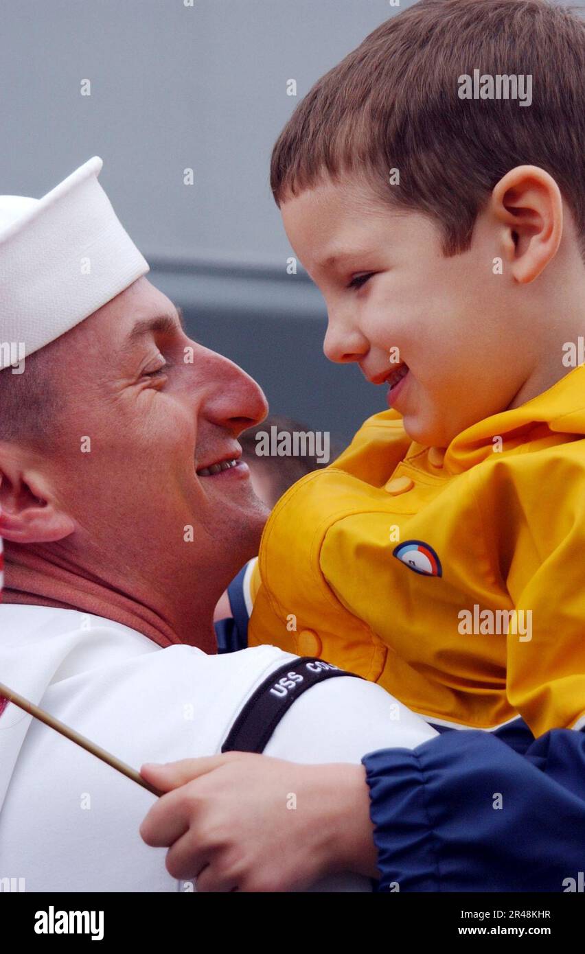 US Navy Sailor is greeted by son during homecoming Stock Photo - Alamy