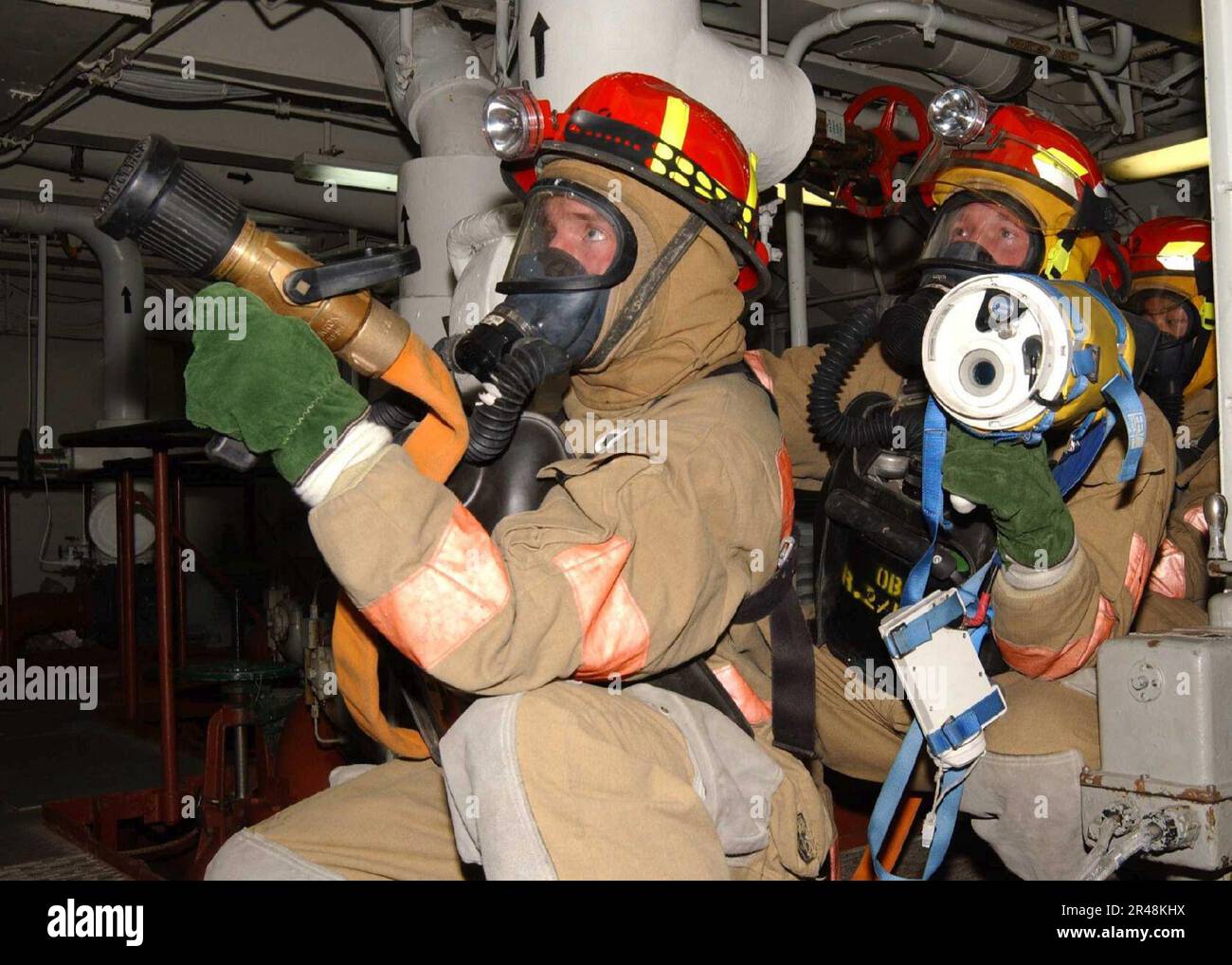US Navy Firefighting drill on board CVN 72 Stock Photo - Alamy