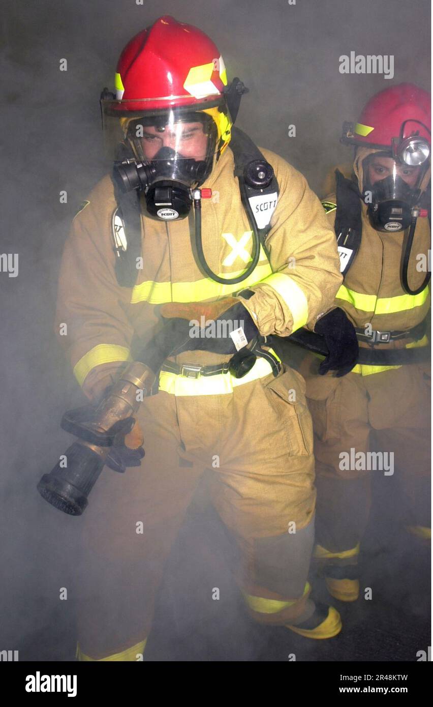 US Navy USS Nimitz - firefighting drill Stock Photo - Alamy