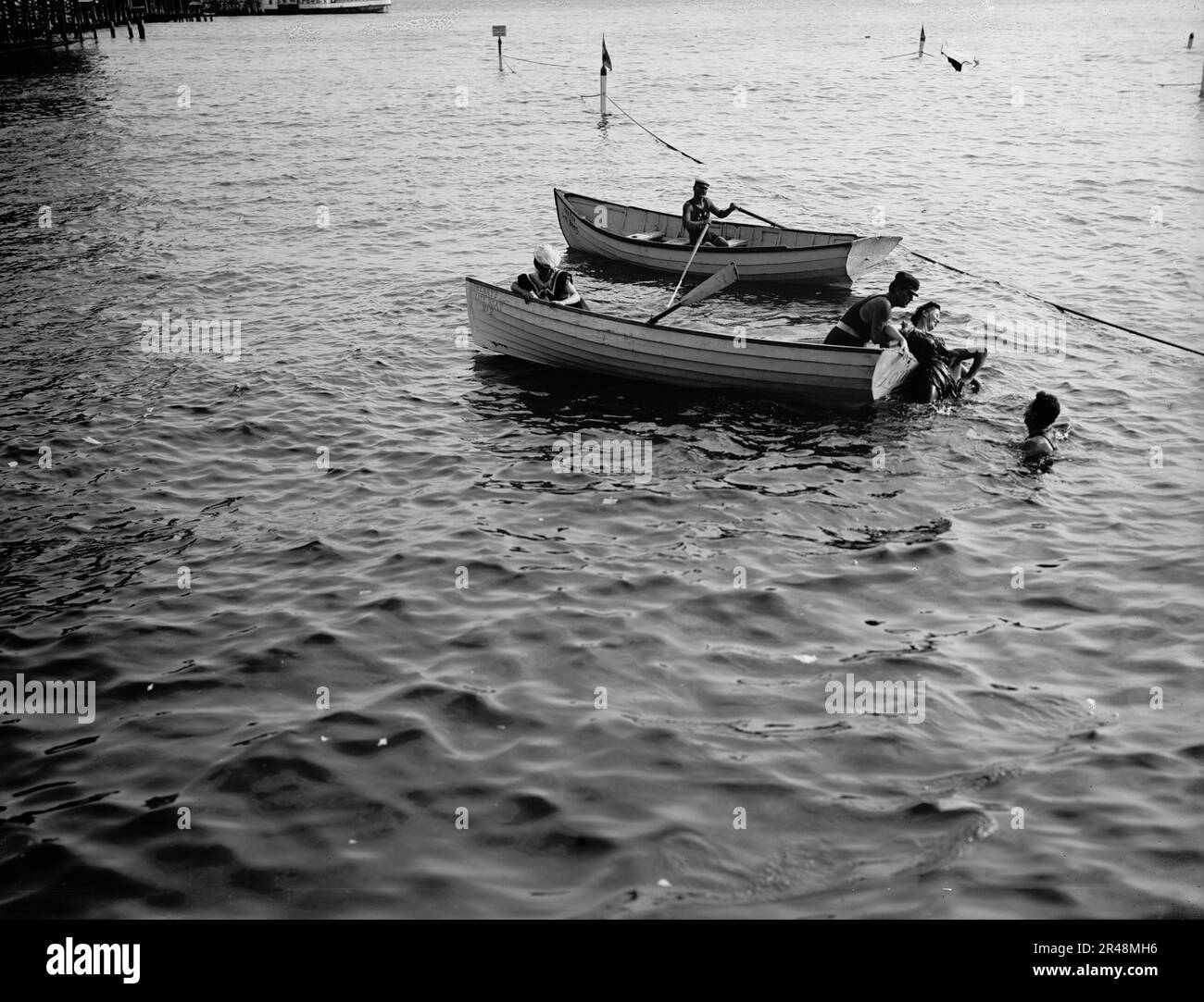 Women saving Black and White Stock Photos & Images - Alamy