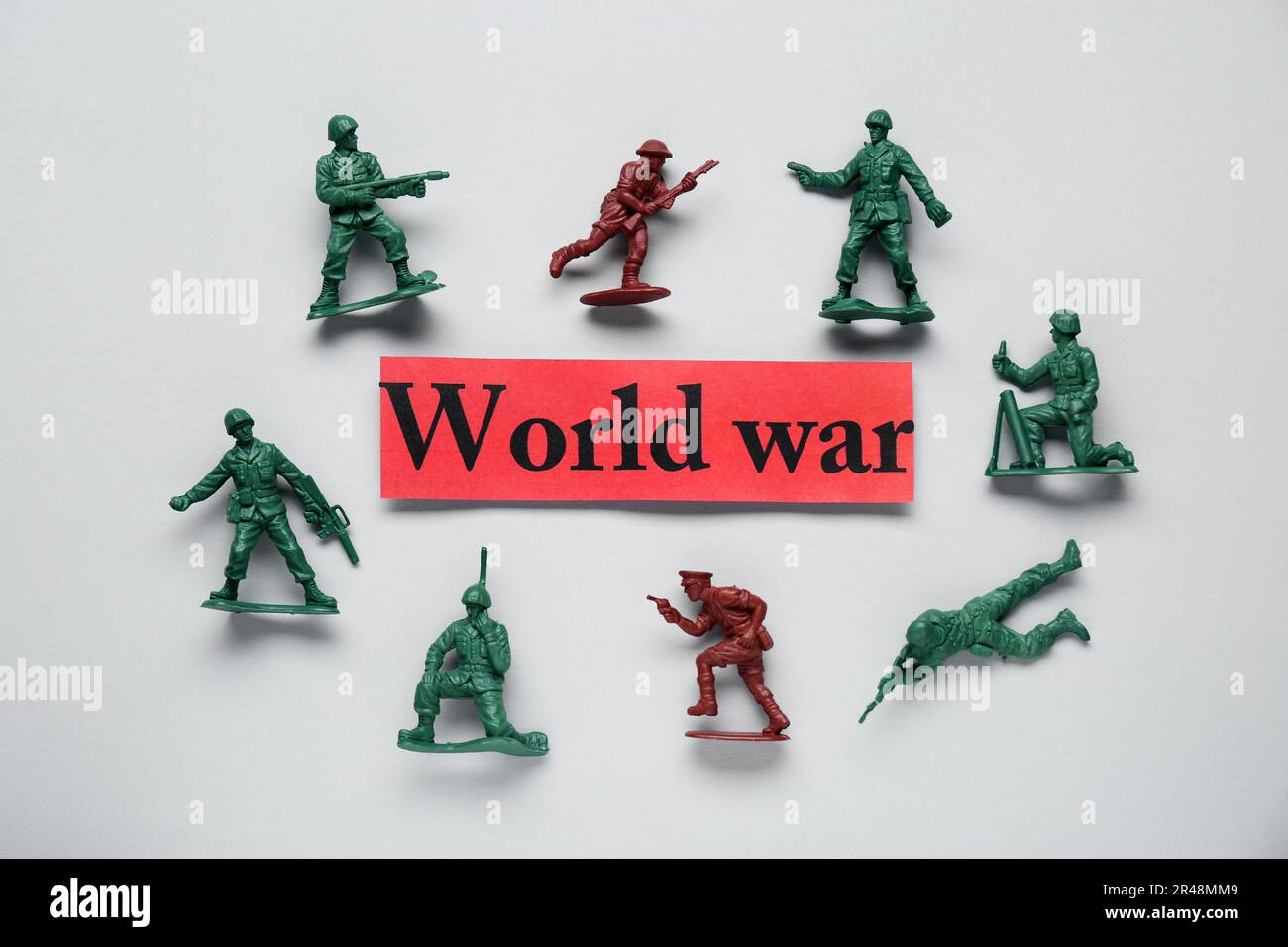Paper with words World War and toy soldiers on white background, flat ...