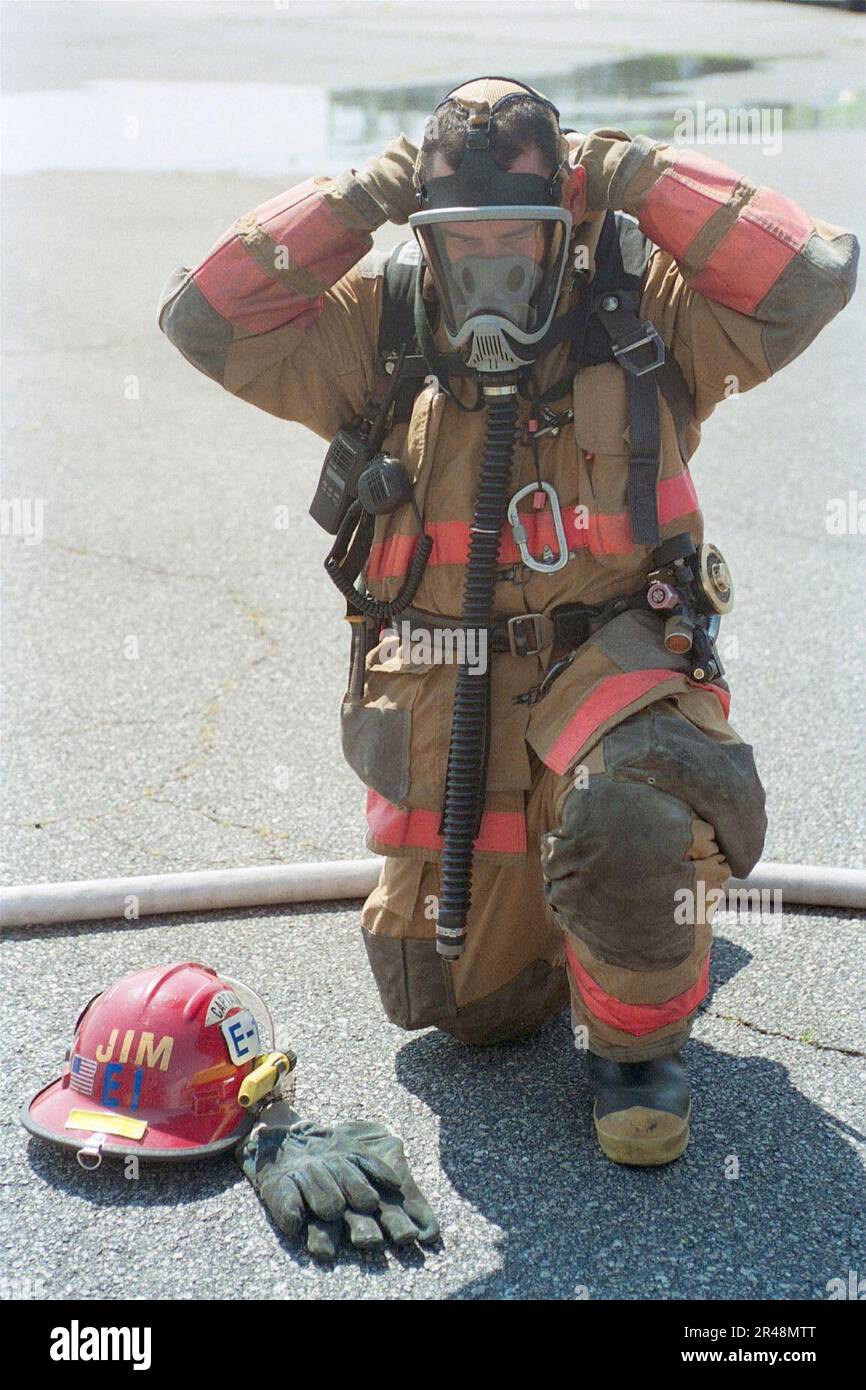 US Navy A firefighter from the Norfolk Naval Base Fire Department ...