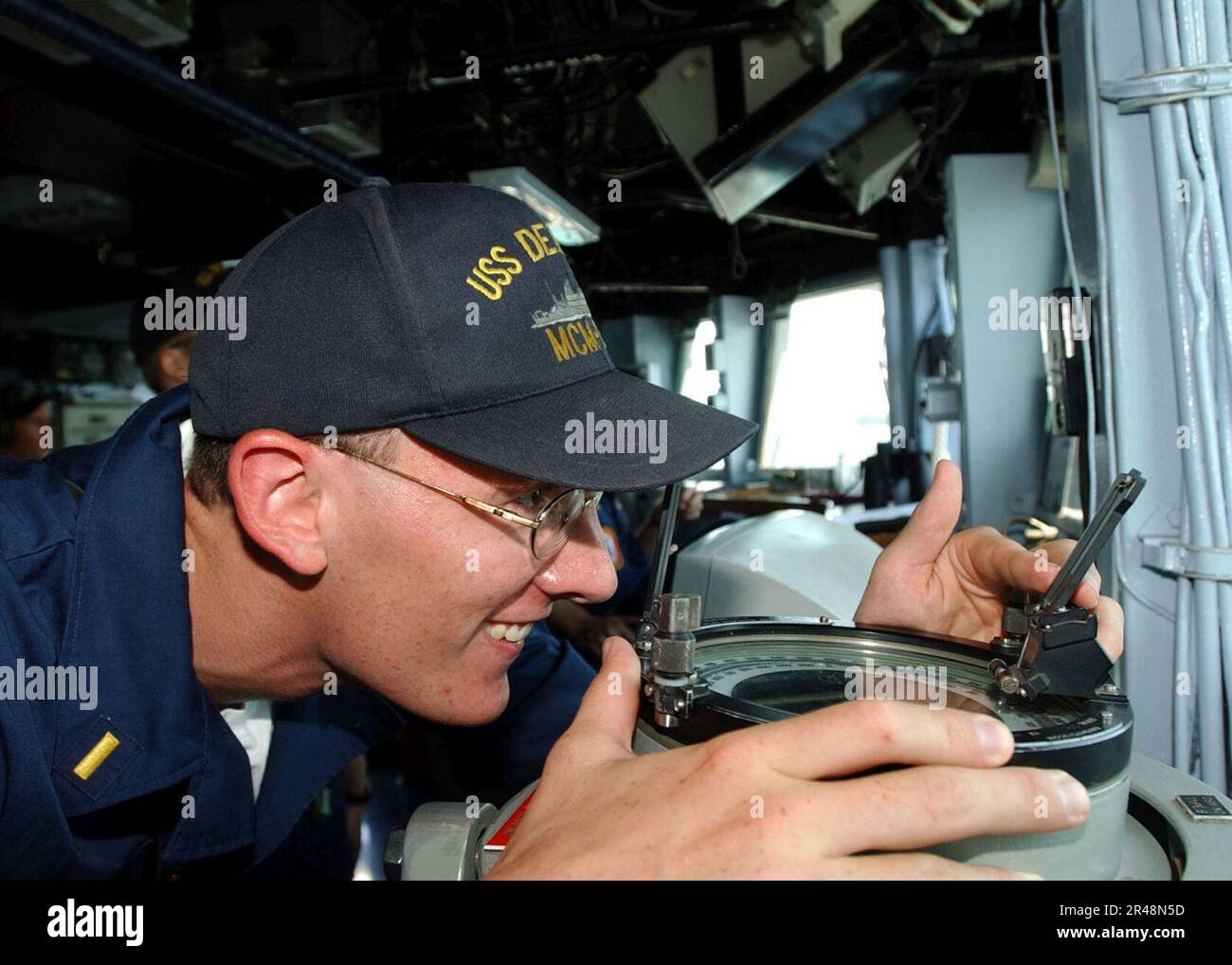 US Navy Junior Officer of the Deck aboard the mine hunter coastal ship ...