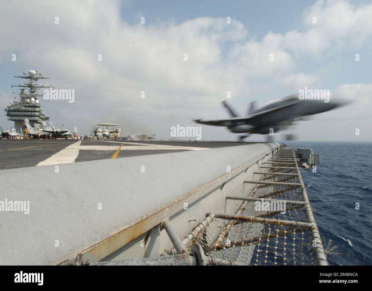 US Navy F-A-18 catapult launch from flight deck Stock Photo - Alamy
