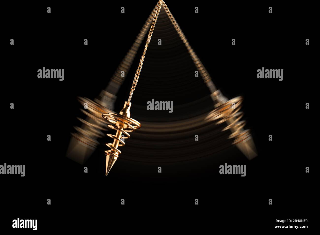 Hypnosis session. Pendant swinging on black background, motion effect ...