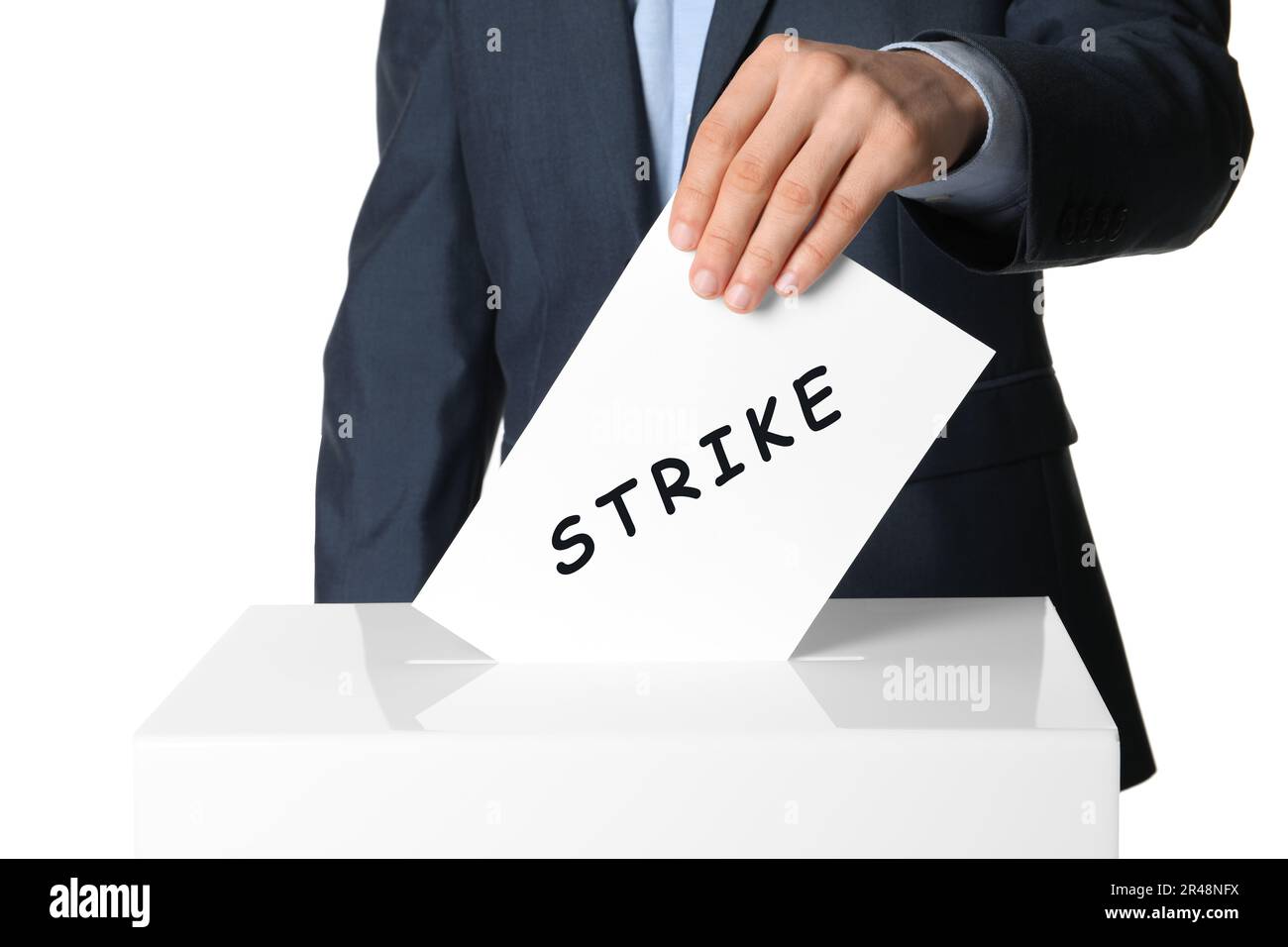 Man putting his vote with word Strike into ballot box on white ...
