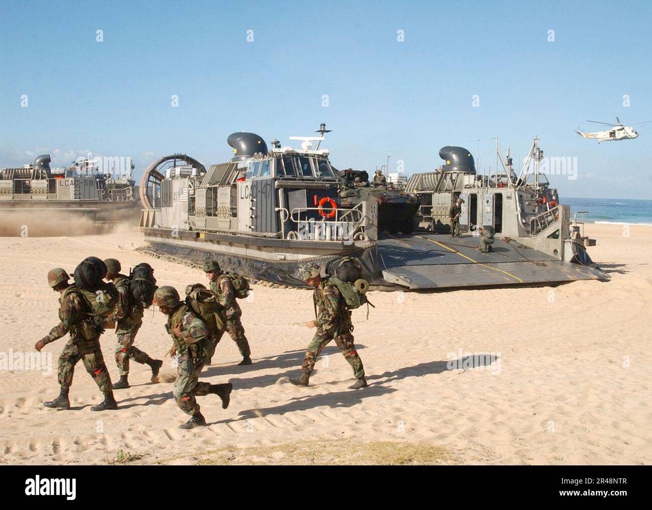 US Navy U.S. Marine beach assault Stock Photo - Alamy