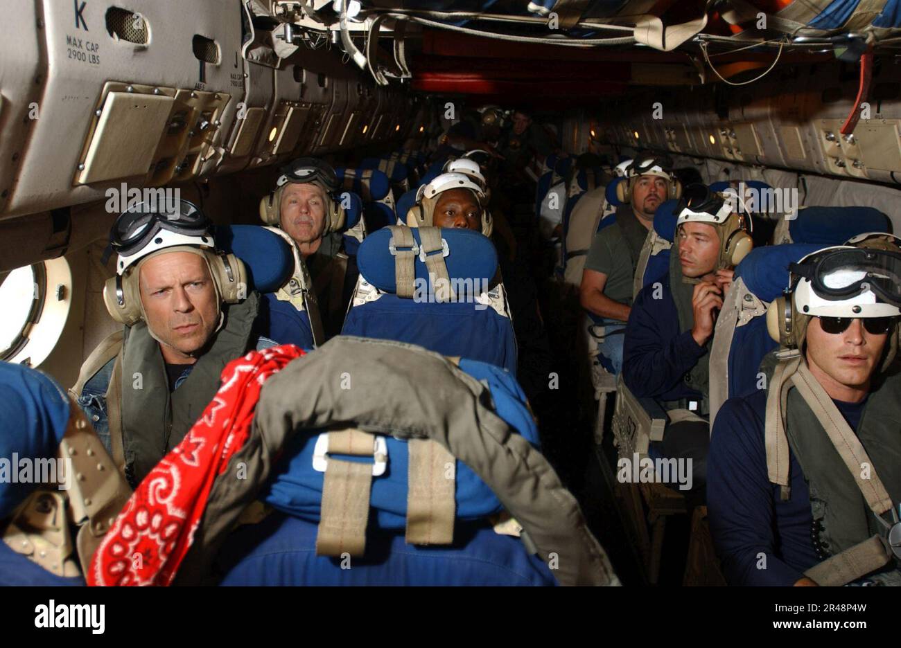 US Navy Actor Bruce Willis and film crew prepare for a C-2 flight Stock ...