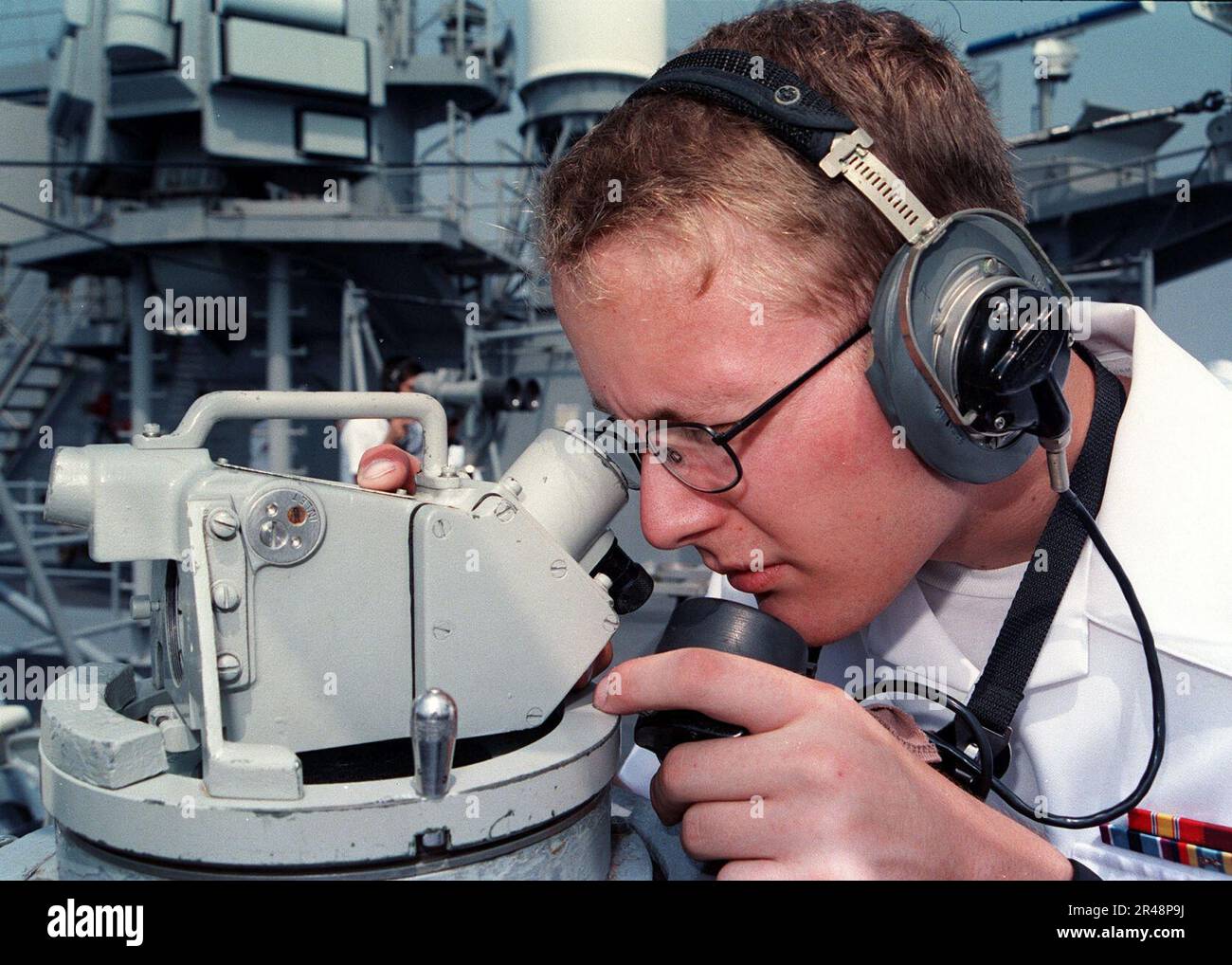 US Navy A Quartermaster navigates aboard the USS Blue Ridge Stock Photo ...