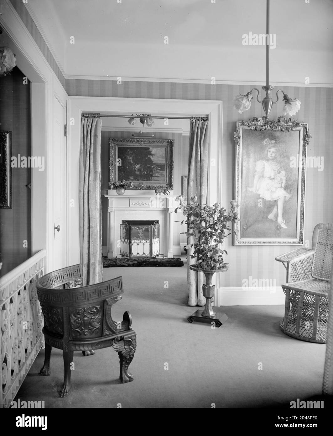 Room with painting of child, roses, and portiere, between 1900 and 1915 ...