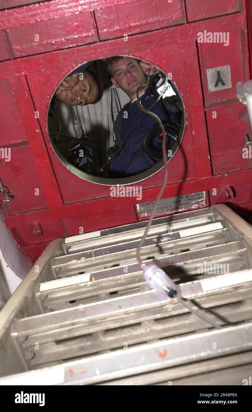 US Navy Damage Control training drill aboard ship Stock Photo - Alamy