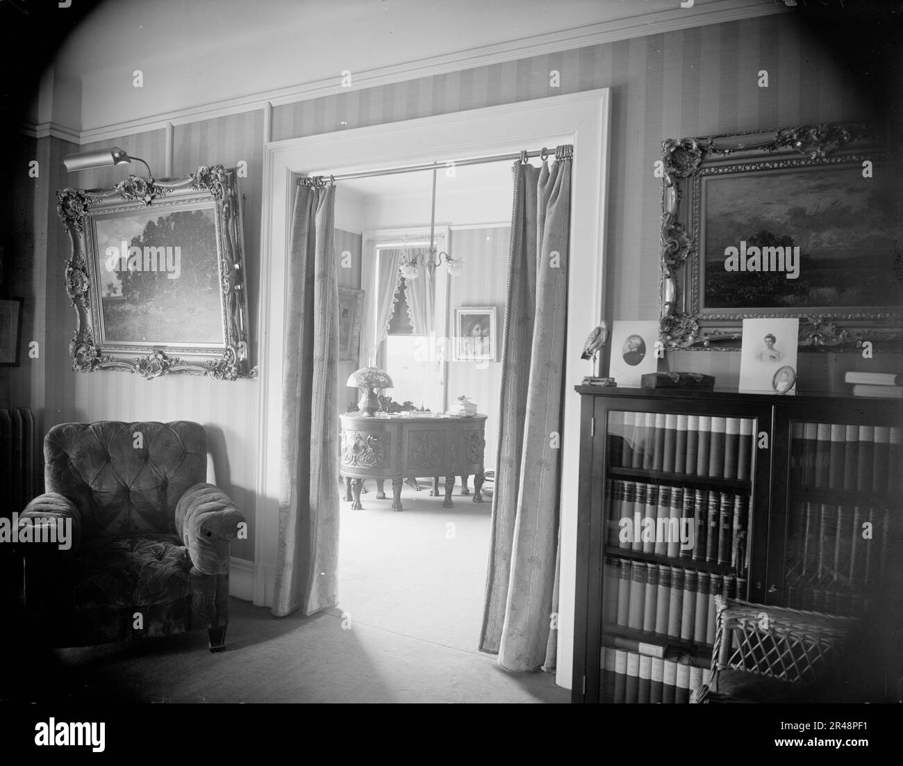 Room with bookcase, study with desk, between 1900 and 1915 Stock Photo ...