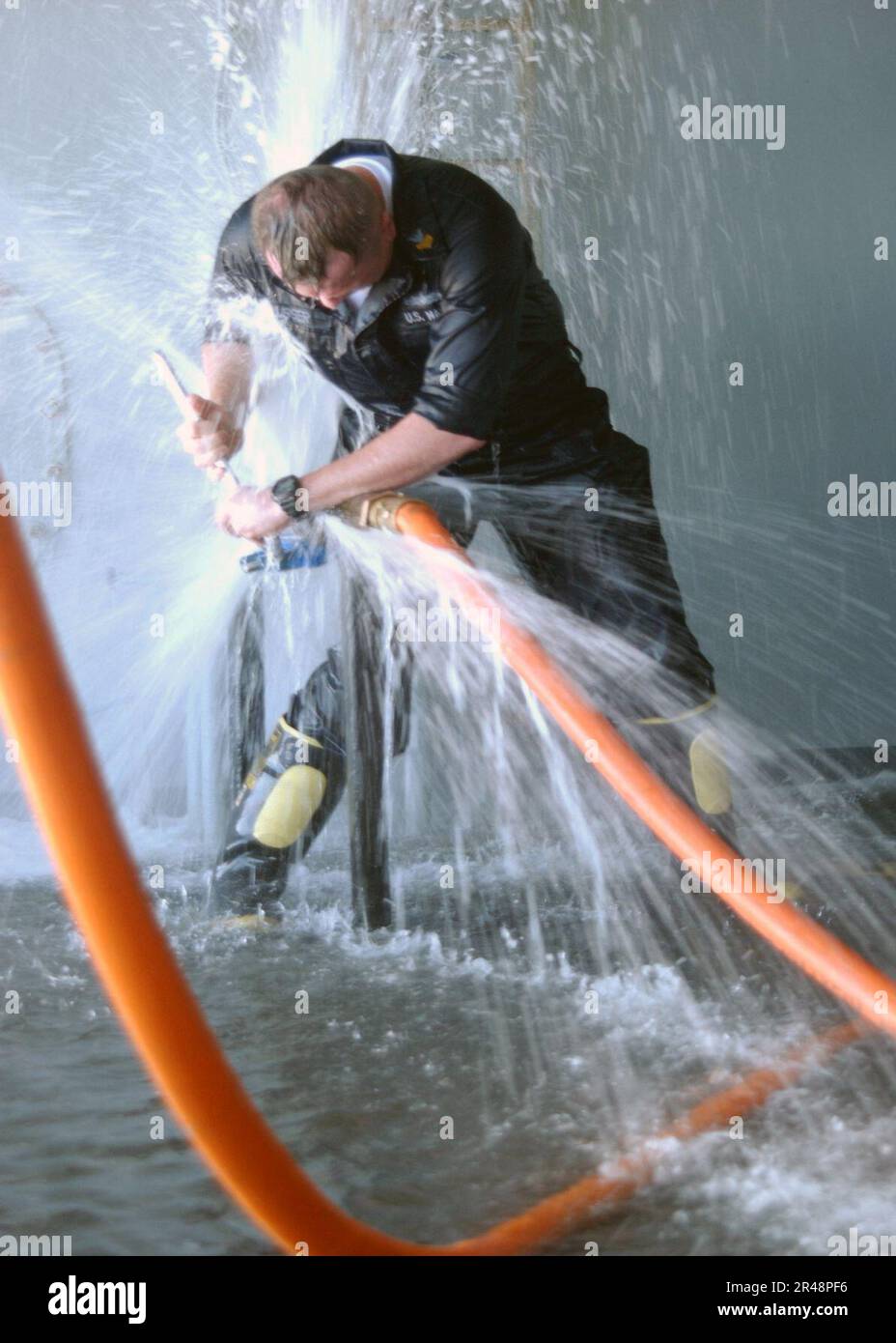 US Navy USS Abraham Lincoln (CVN 72) pipe-patching techniques during a ...