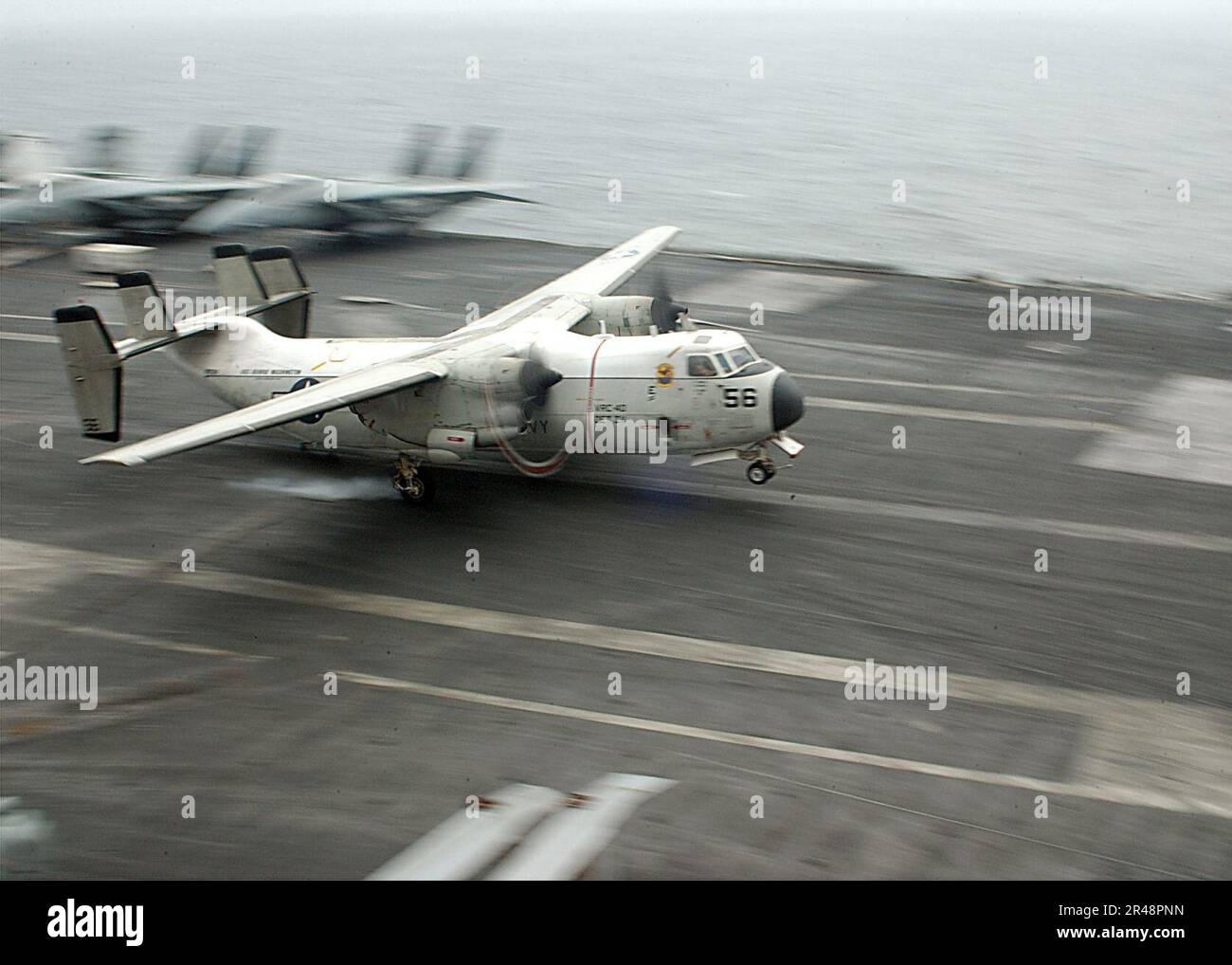US Navy C2-A makes an arrested landing Stock Photo - Alamy