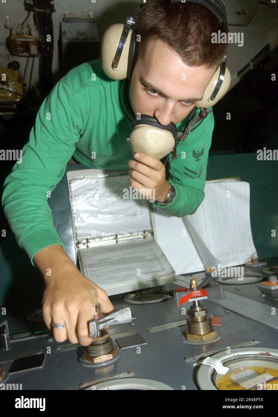 US Navy panel operator watch for the steam catapults Stock Photo - Alamy