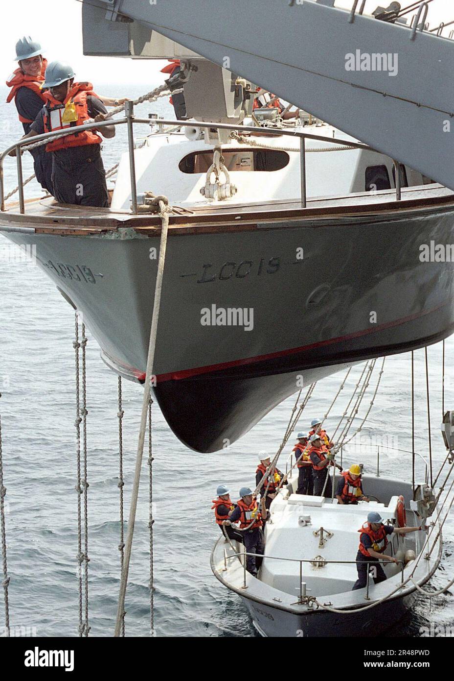 US Navy Sailors man ''monkey line'' ropes while practicing deployments ...