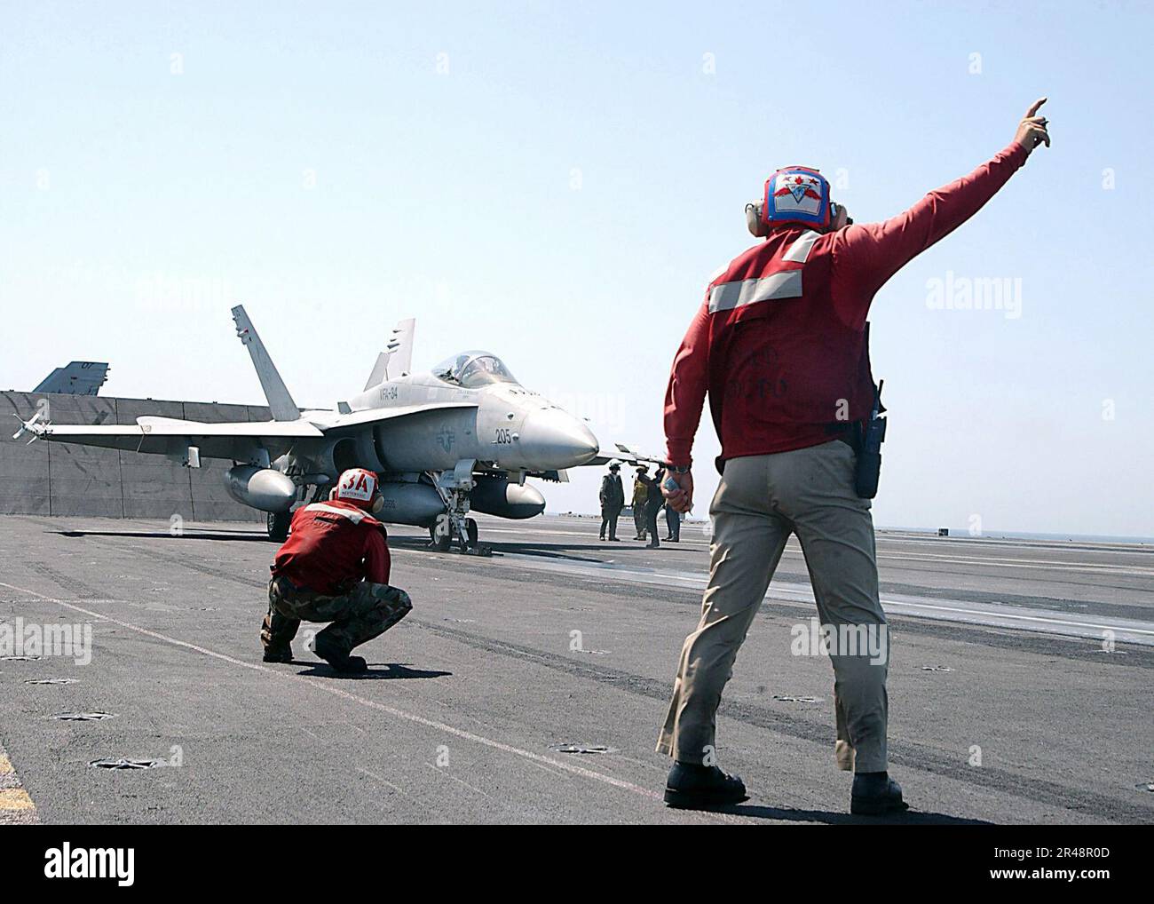 US Navy Arming the weapons on an F-A-18 Hornet Stock Photo - Alamy
