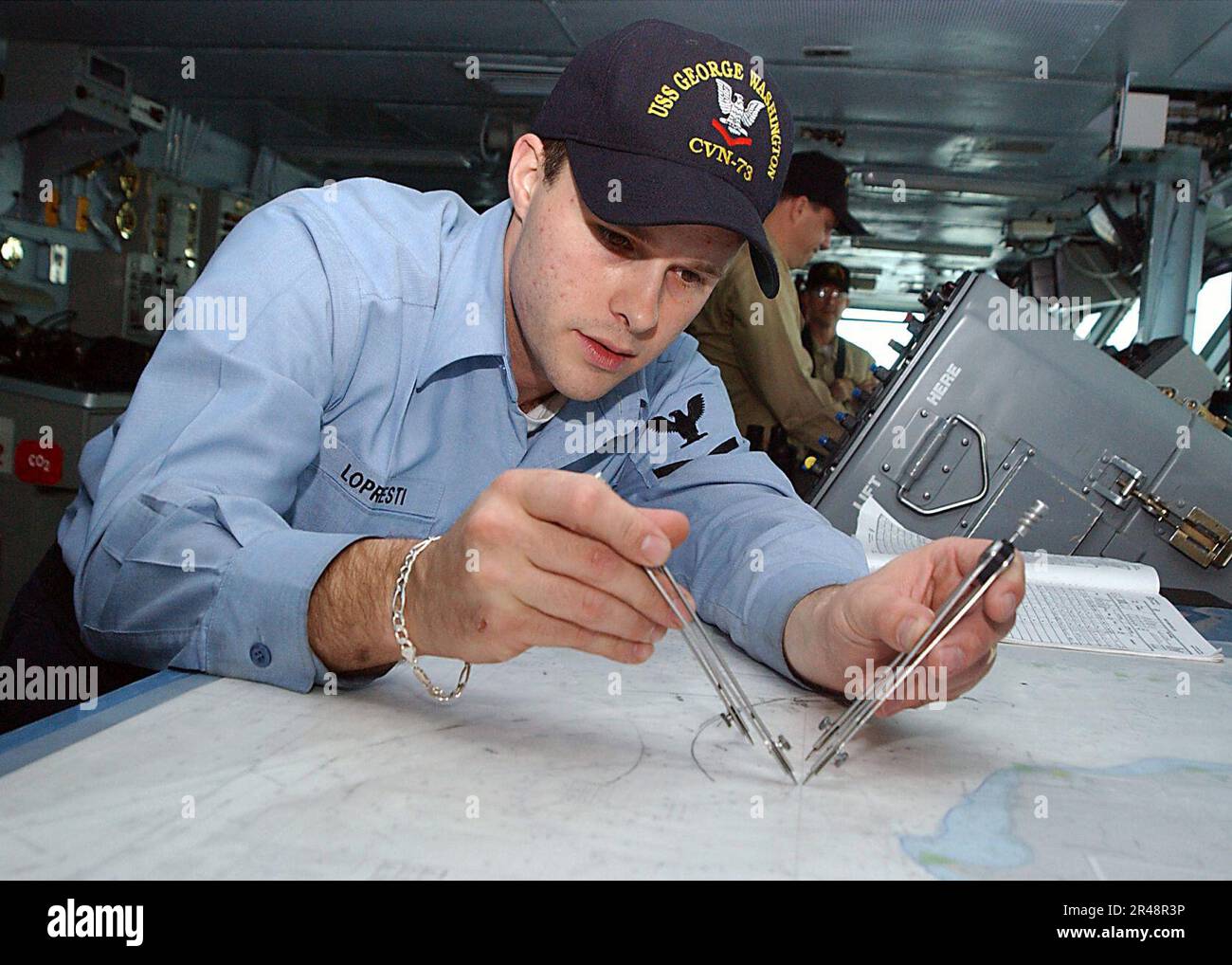 US Navy plotting the current position of USS Washington Stock Photo - Alamy