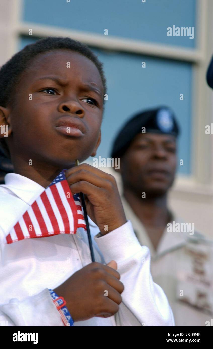 US Navy Elementary students recite the Pledge of Allegiance during 9-11 ...