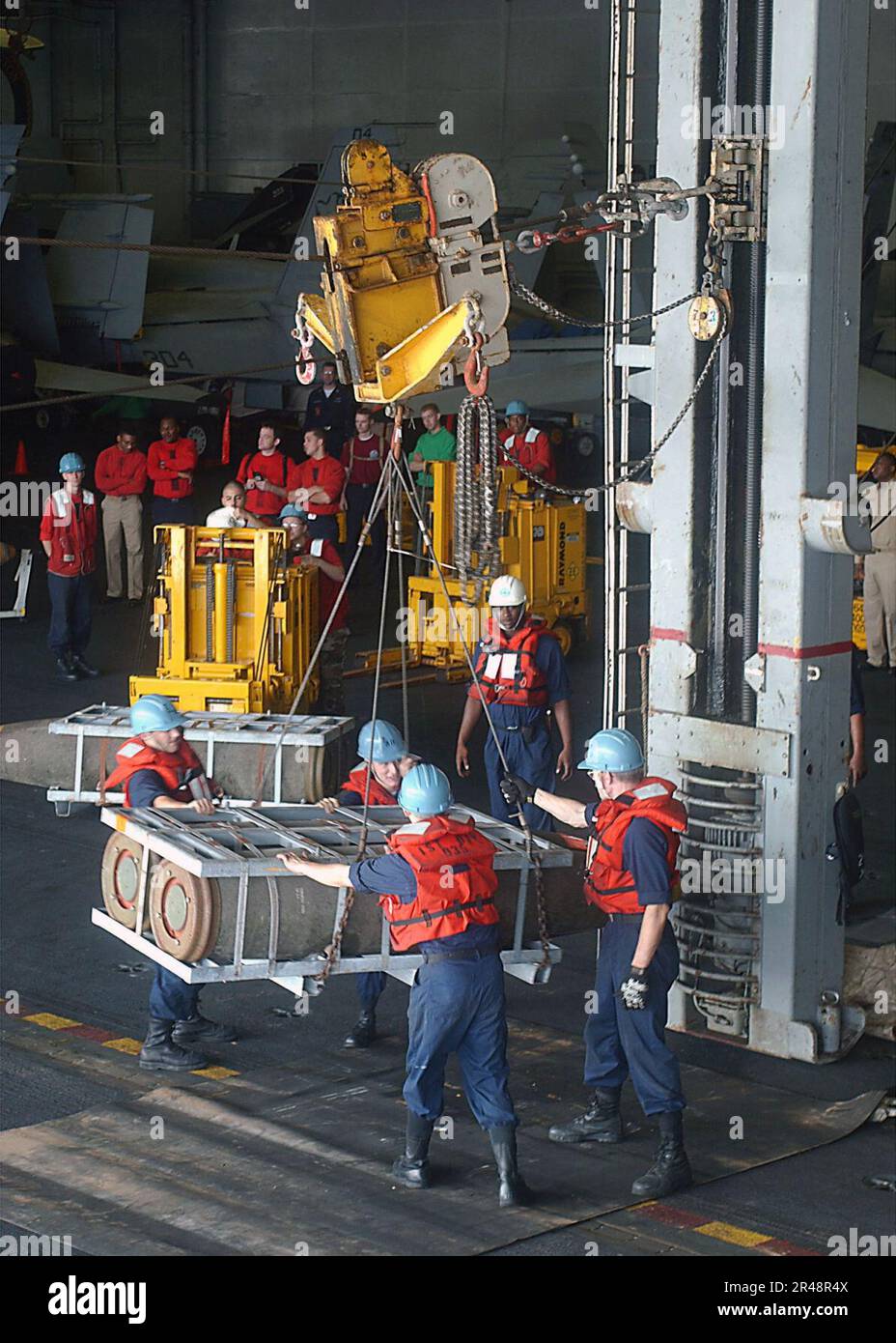 US Navy directing ordnance during unrep Stock Photo - Alamy