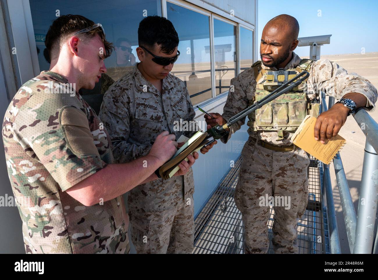 A U.S. Marine Task Force 51/5 fires officer, calls in a target with a U ...