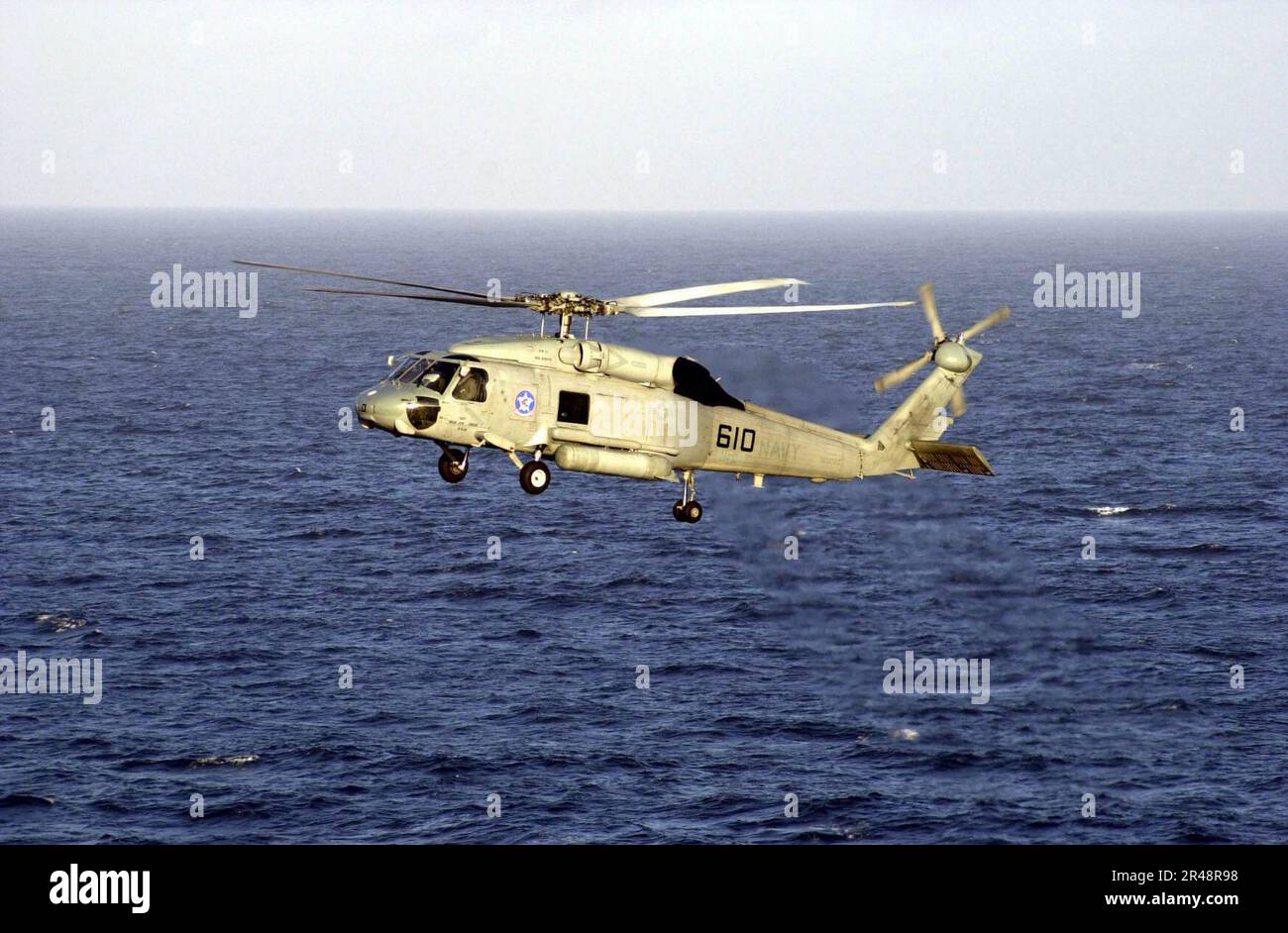 US Navy SH-60 Seahawk provides plane guard support Stock Photo - Alamy