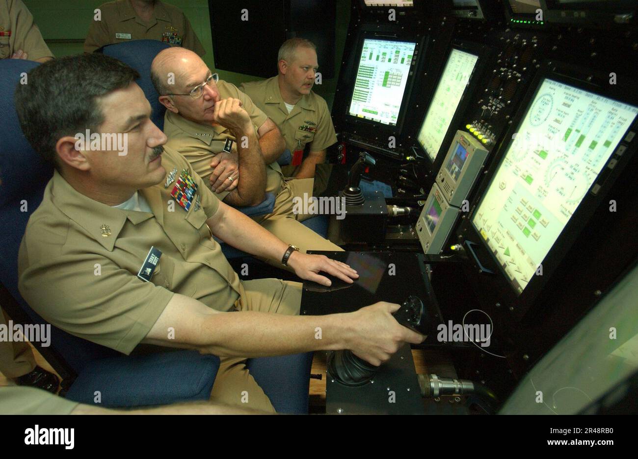 US Navy MCPON uses submarine simulator Stock Photo - Alamy