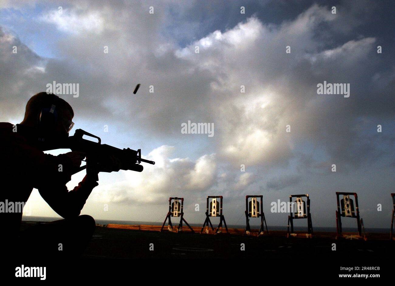 US Navy A Sailor requalifies on the M-16A3 rifle during a weapons fire ...