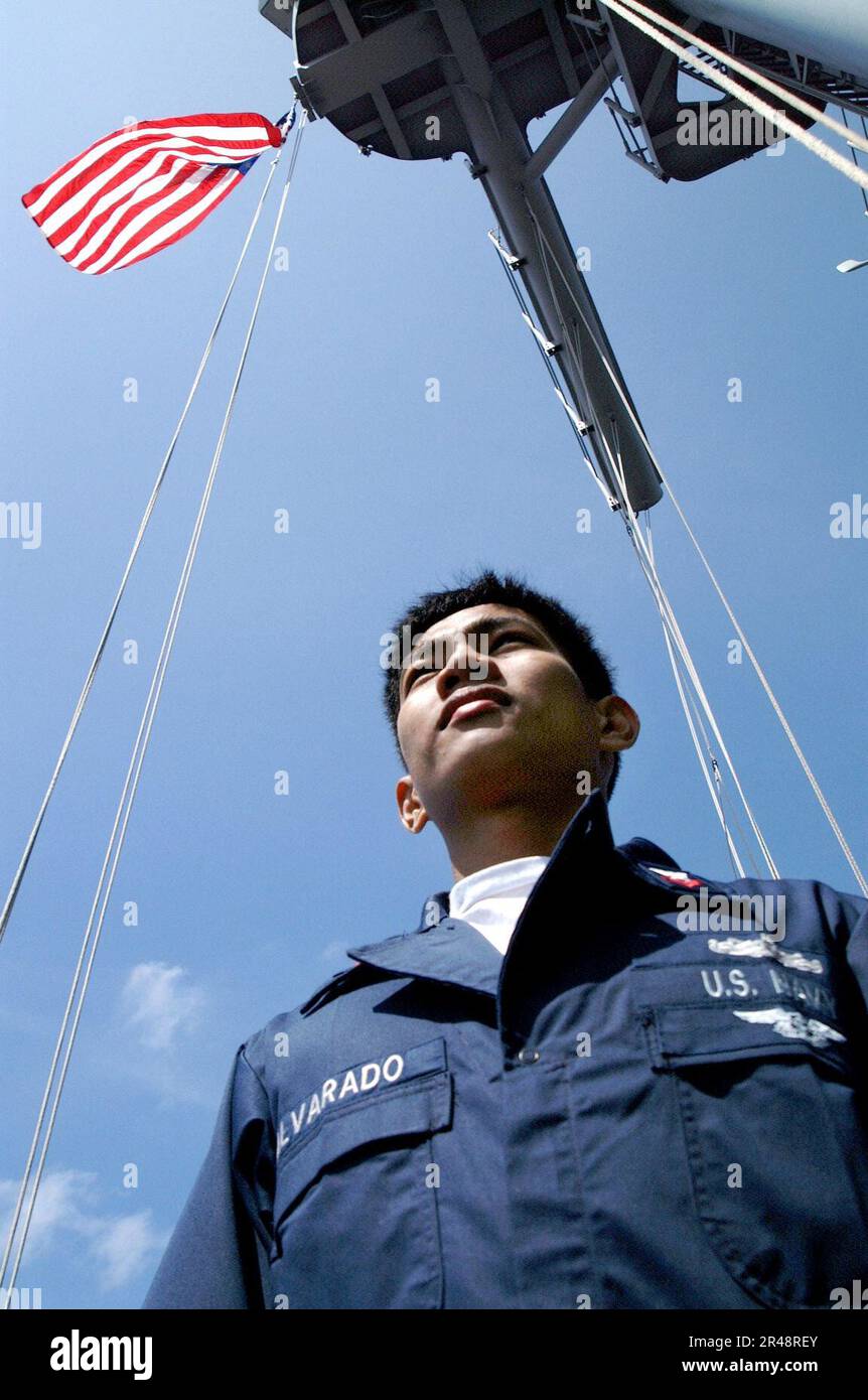 US Navy A Sailor stands watch on the ship's navigational bridge as the ...