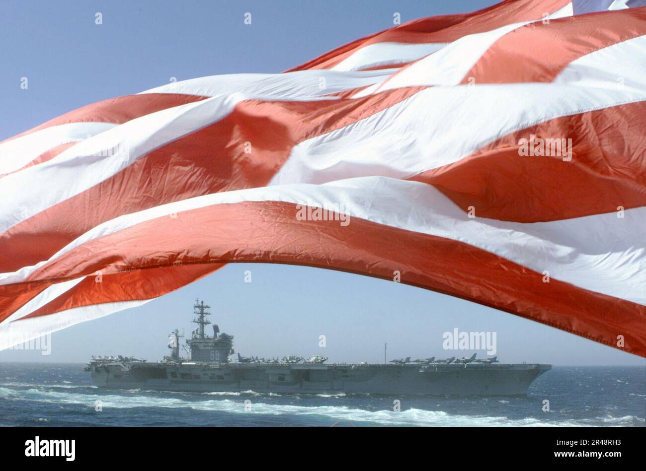 US Navy The USS Nimitz (CVN 68) steams alongside the Princeton as the ...