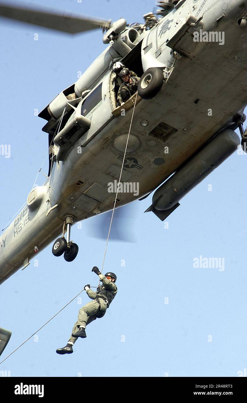 US Navy A Sailor assigned to Explosive Ordnance Disposal (EOD) Team Two ...