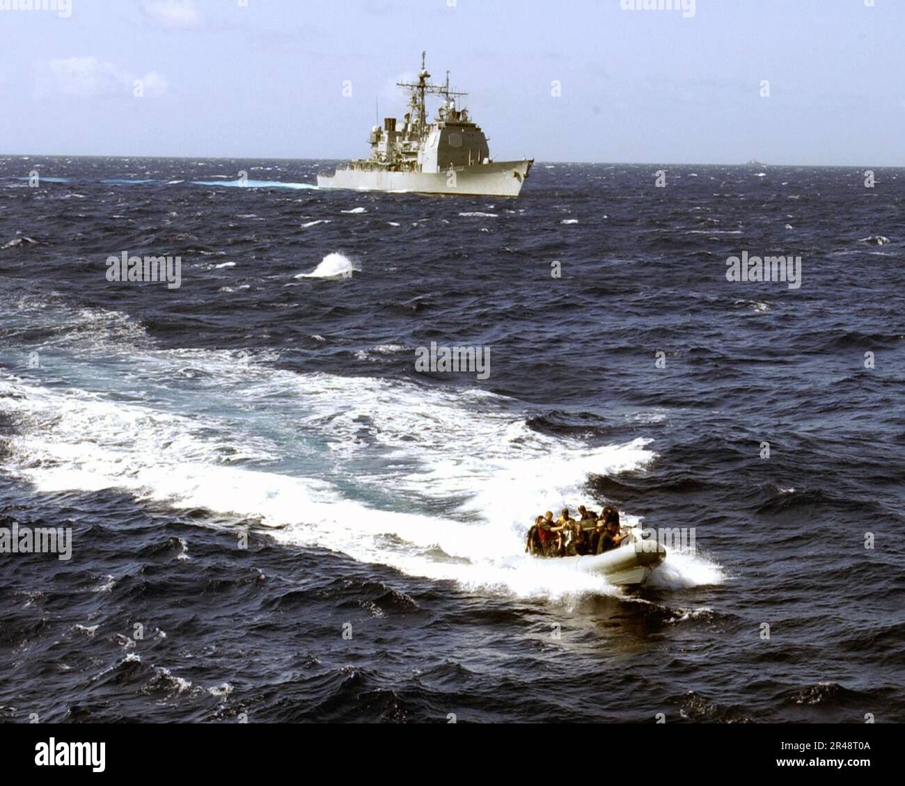 US Navy Crewmembers from the guided missile cruiser conduct Maritime ...
