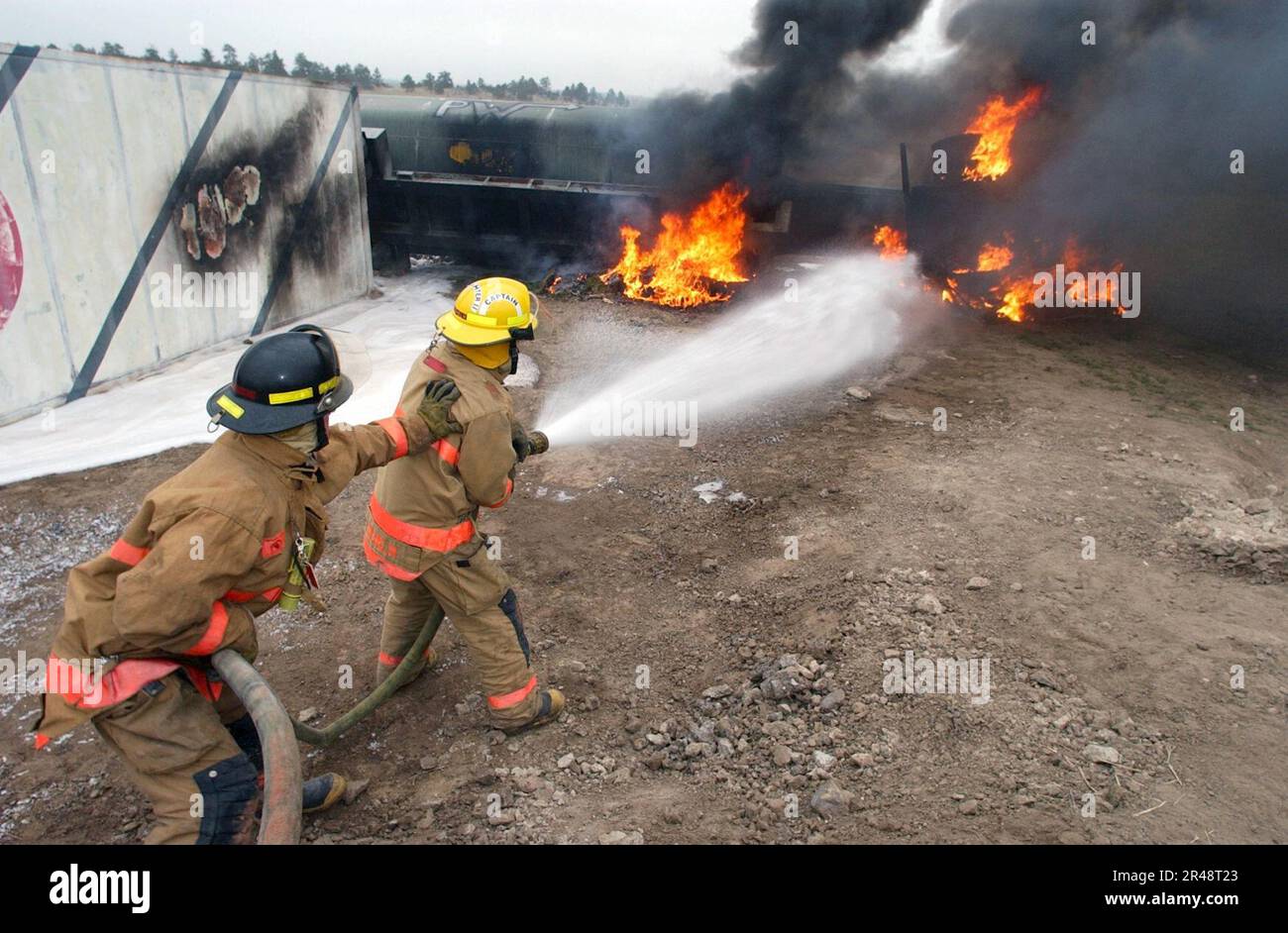 US Navy Fire fighting training during Diligent Warrior 2003 Stock Photo ...