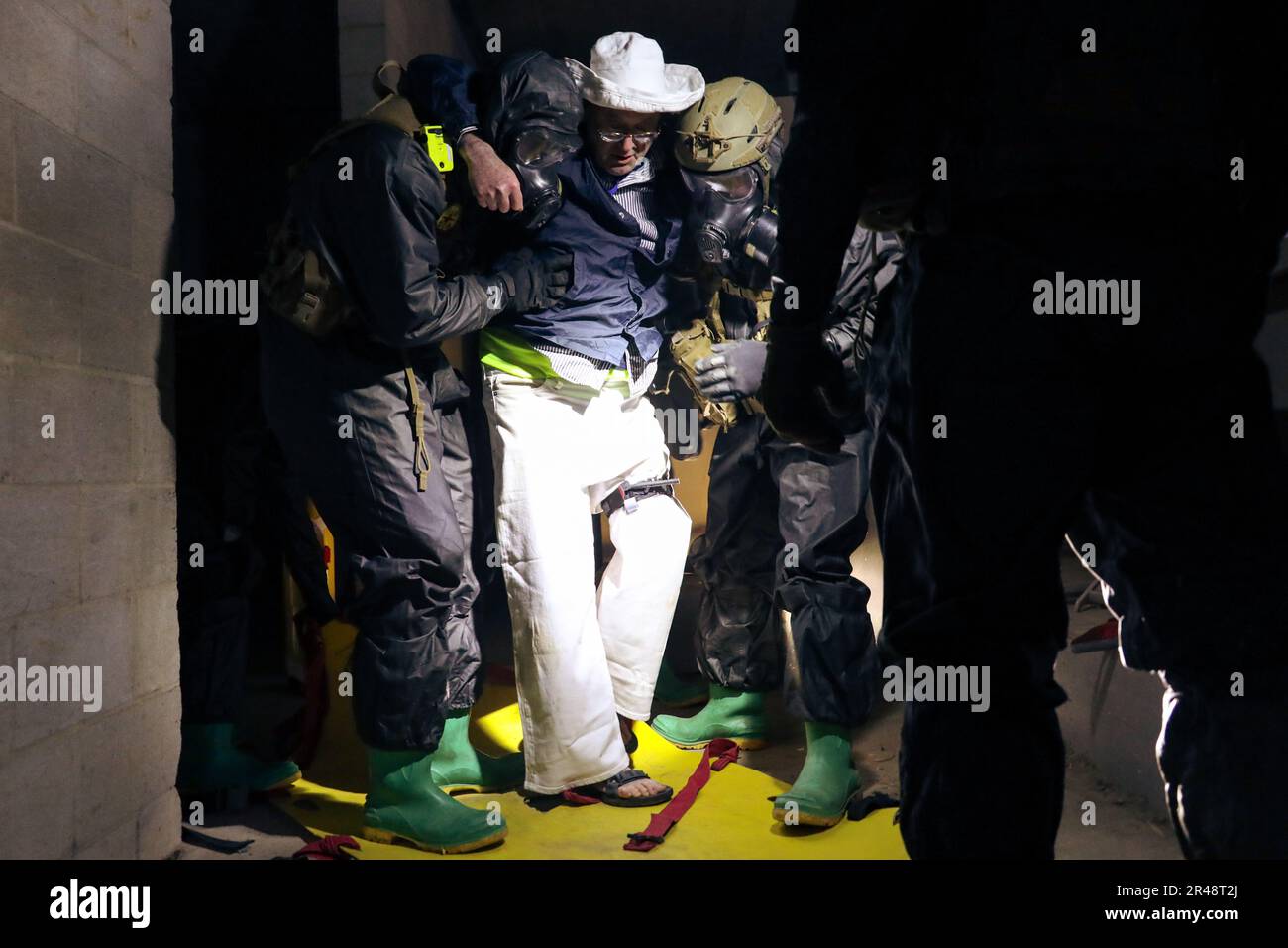 U.S. Marines with Chemical Biological Incident Response Force, put a ...