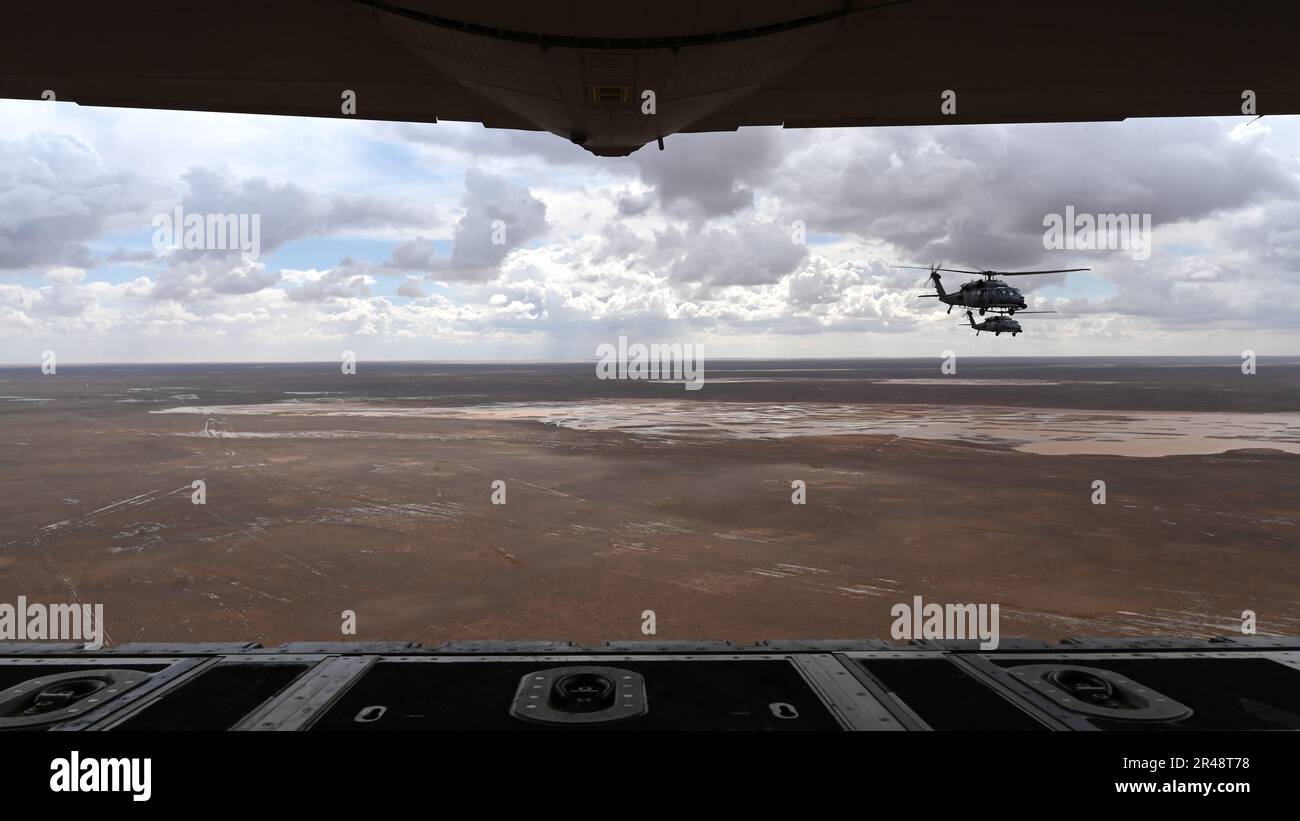 Two U.S. Air Force HH-60s assigned to the 46th Expeditionary Rescue ...